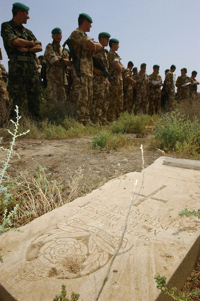 Members of the Intelligence Corps gather at Basra War Cemetery, Iraq ...