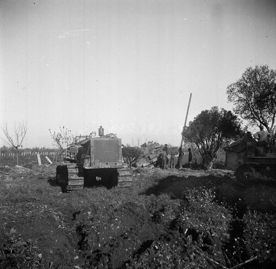 Bulldozer and a ditched Sherman tank, Abruzzo, Italy, 1943 | Online ...