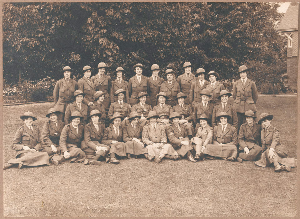 Queen Mary's Army Auxiliary Corps soldiers in a garden, 1918 (c ...