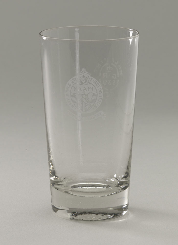Half-pint beer glass, tapering, with a sand-blasted NAAFI crest and ...