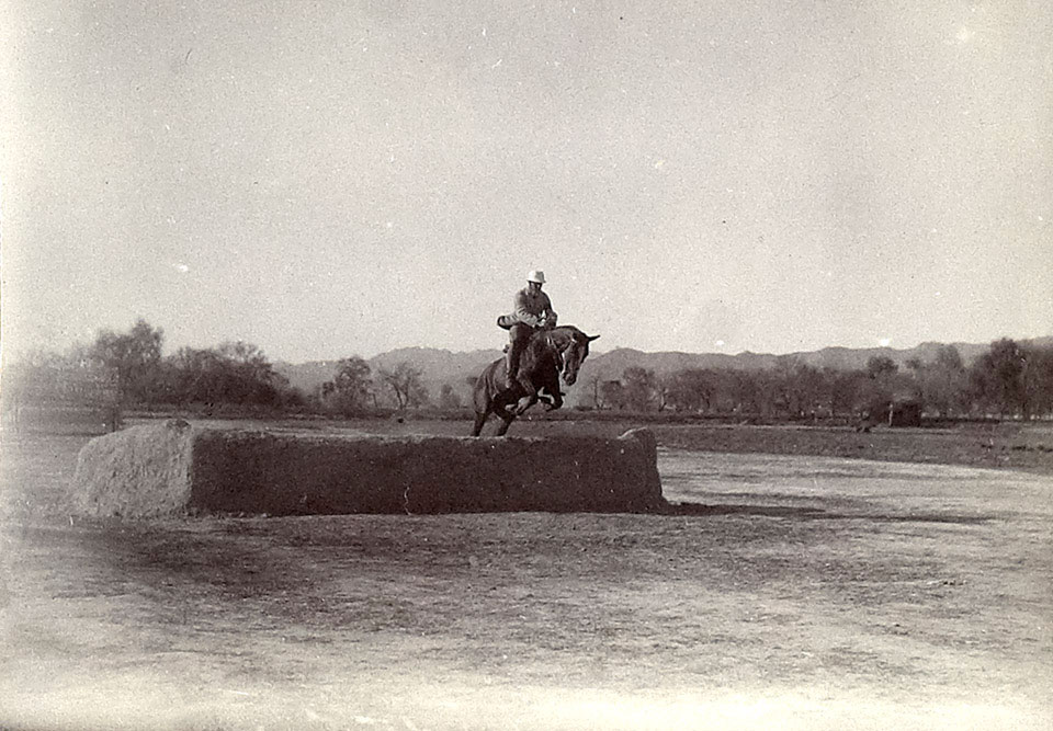 Lieutenant Kenneth Barge, 17th Cavalry, jumping fence, India, 1908 (c ...