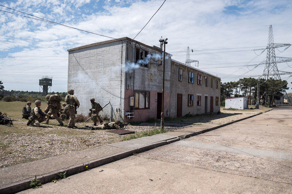Soldiers from the Royal Anglian Regiment engaged in urban warfare ...