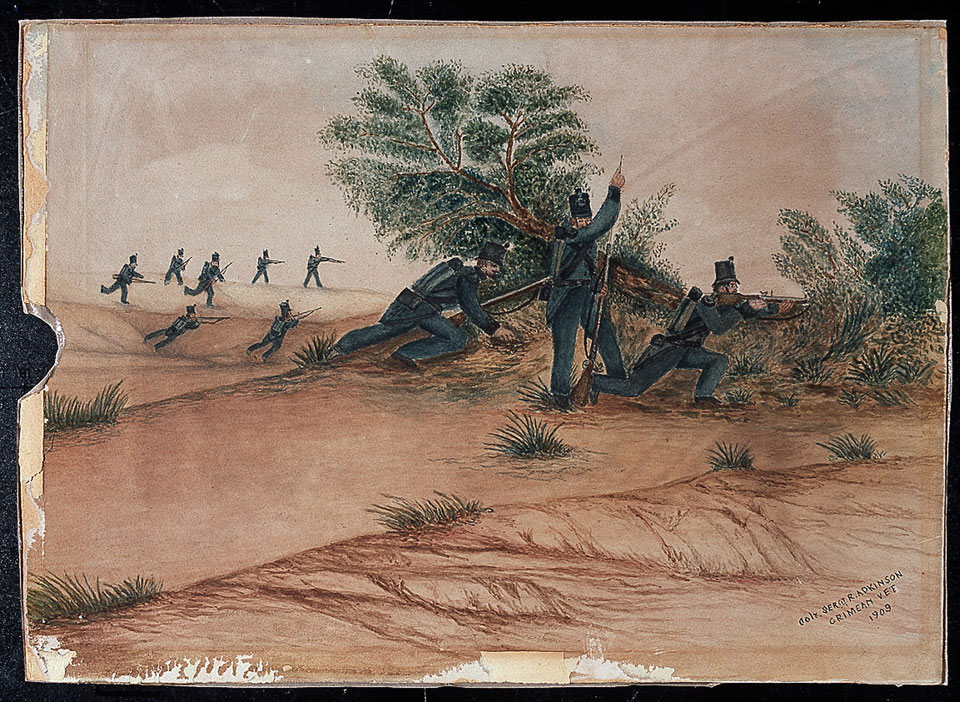 Three riflemen of the Rifle Brigade take cover behind trees and bushes ...